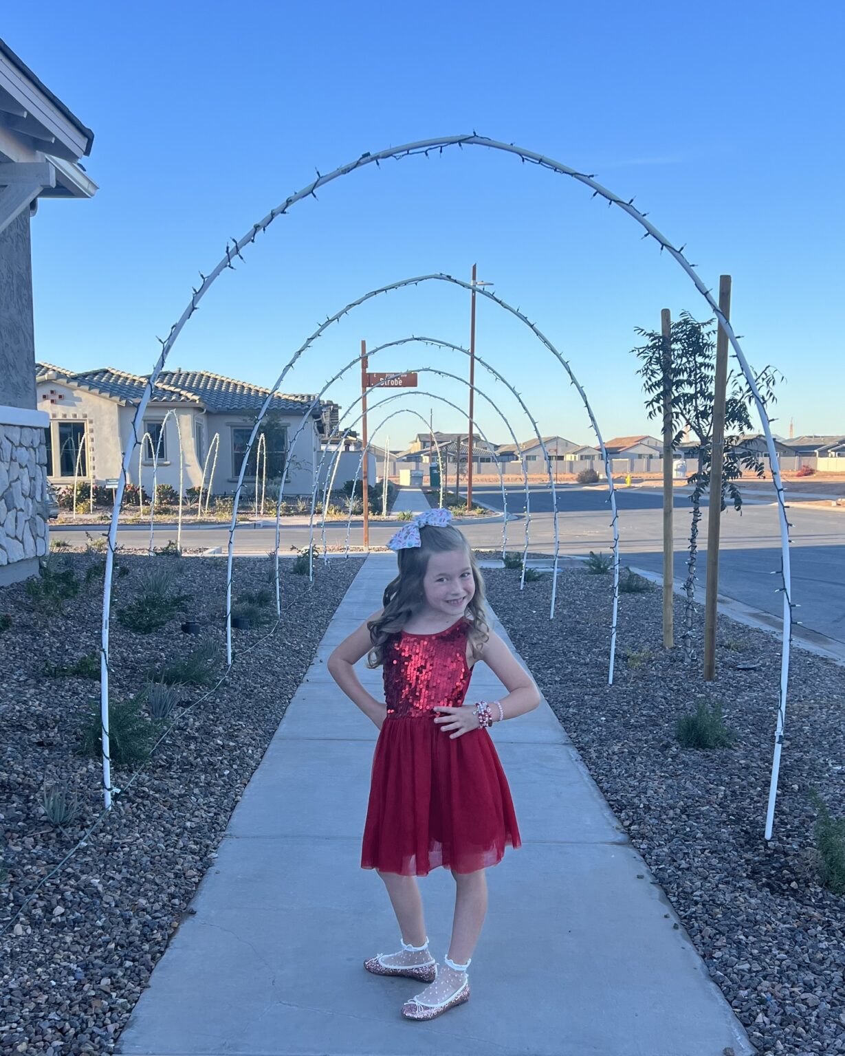 How to Install Light-Up Christmas Arches on Your Sidewalk